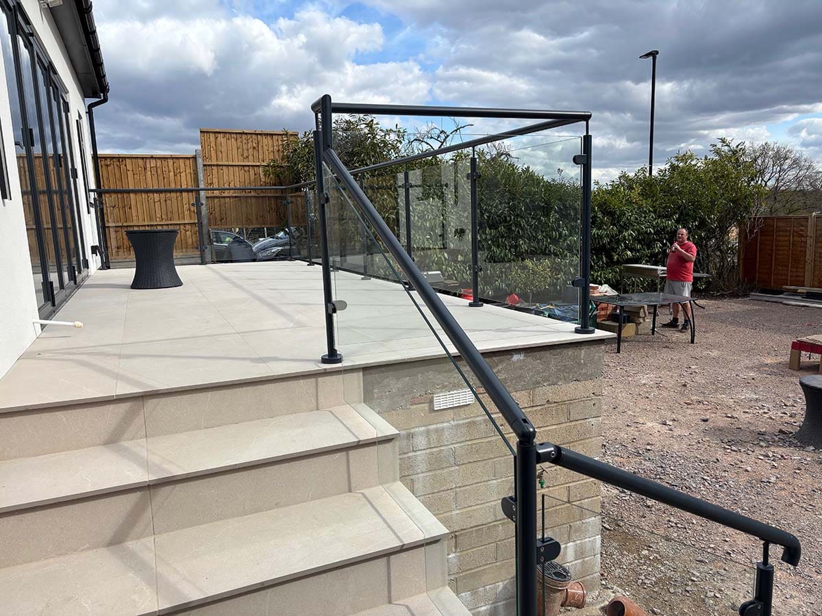 Powder coated finish glass balustrade - Enfield → Visage Glass and Steel